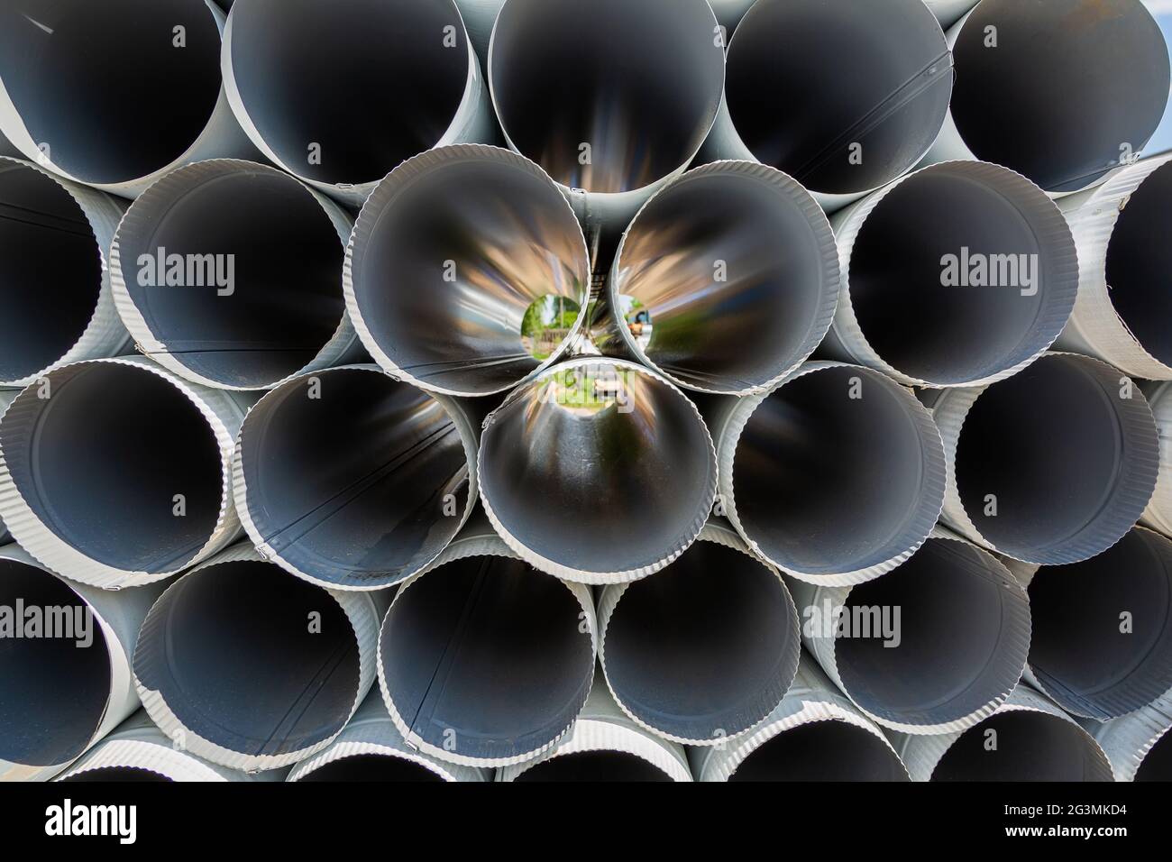Downpipe warehouse. Steel pipes, parts for the construction of a roof ...
