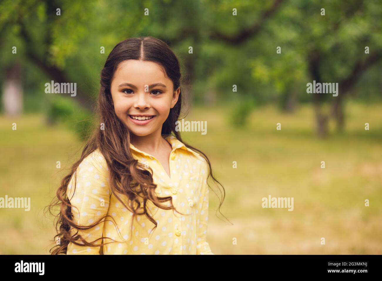 Cute little girl out in nature Stock Photo - Alamy