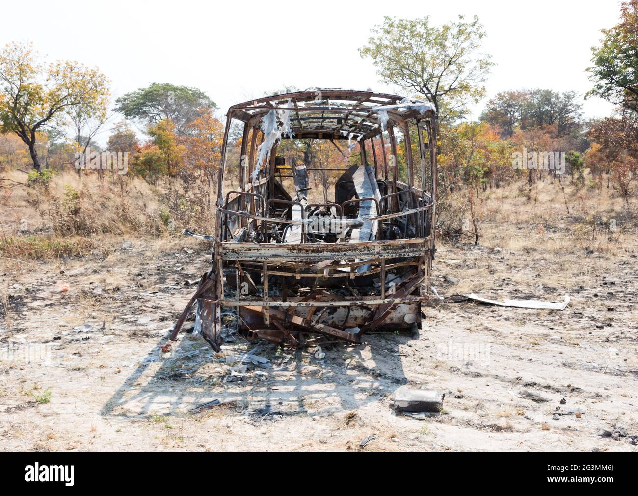 Burned bus at the side of the road Stock Photo - Alamy