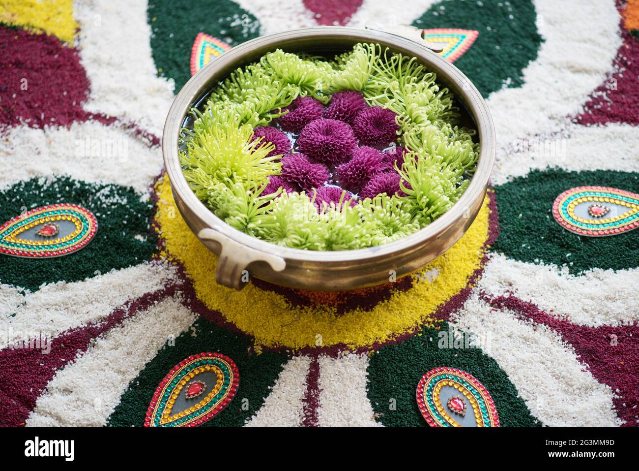 Floral rangoli (kolam) at Indian Hindu wedding Stock Photo - Alamy