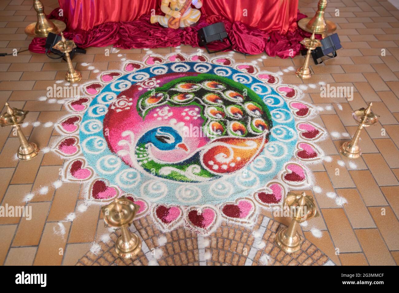 Beautiful rangoli (kolam) at an Indian Hindu wedding Stock Photo - Alamy