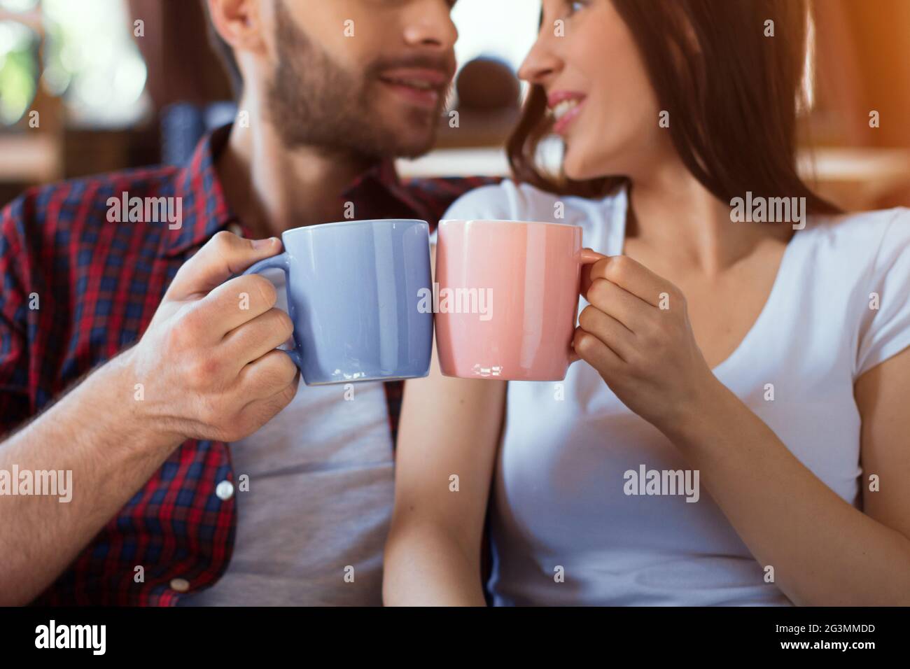 Lovely couple drinking coffee together Stock Photo - Alamy