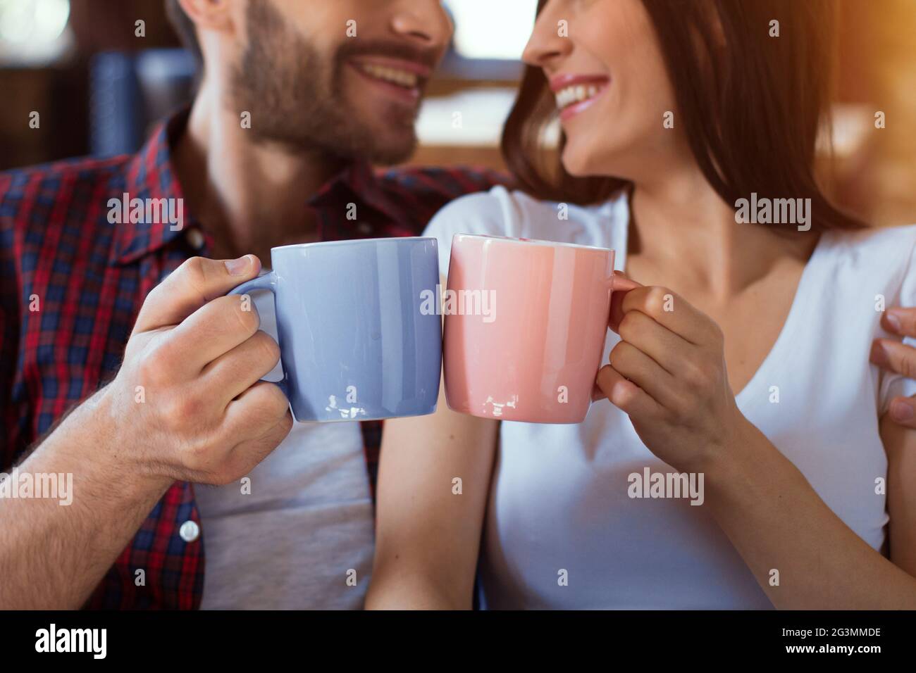 Lovely couple drinking coffee together Stock Photo - Alamy