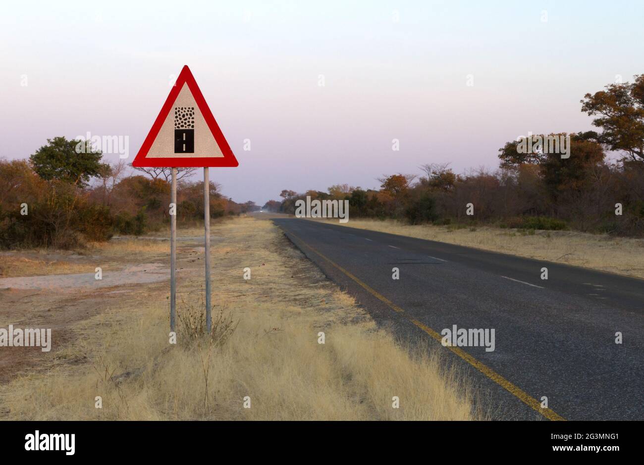 Sign gravel road - Caution the end of a good road Stock Photo - Alamy