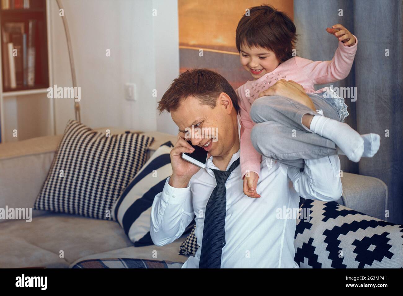 Man working home family hi-res stock photography and images - Alamy