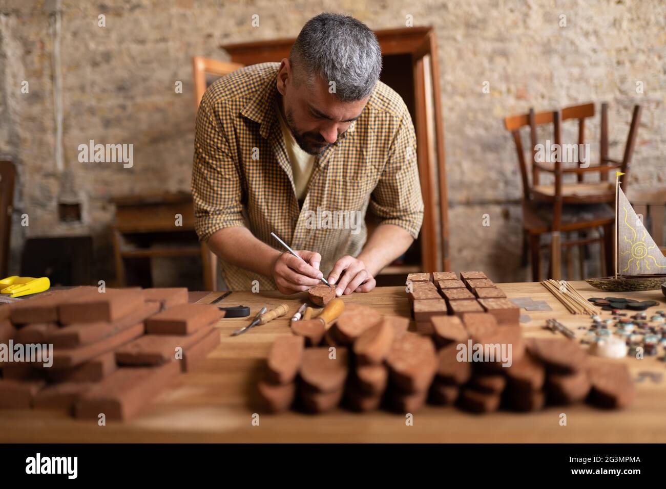 Wood carpenter at work in his workshop Stock Photo - Alamy
