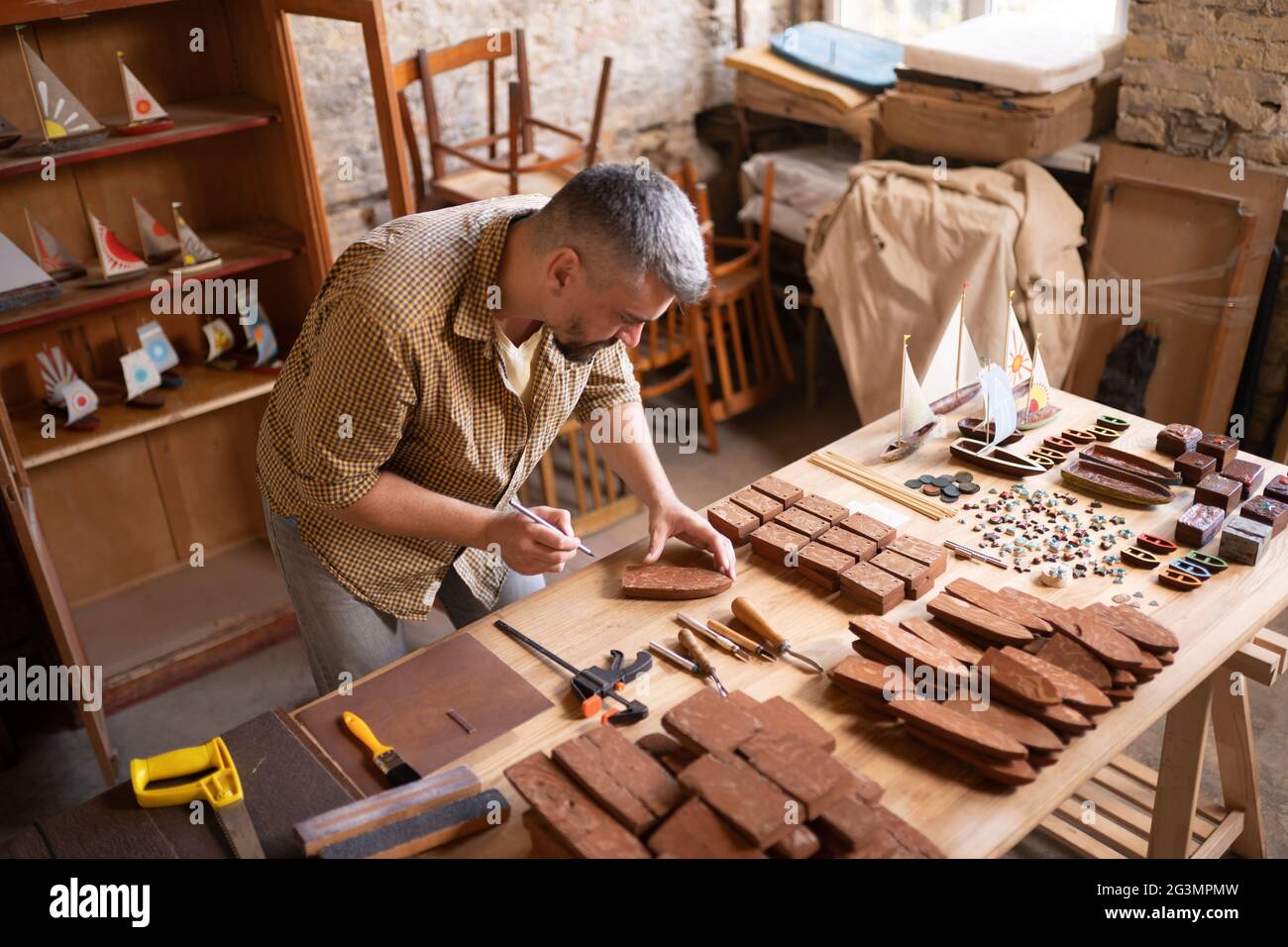 Wood carpenter at work in his workshop Stock Photo - Alamy