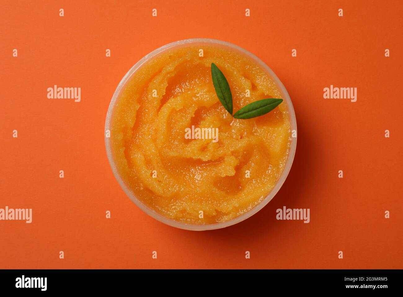Woman body scrub orange hi-res stock photography and images - Alamy