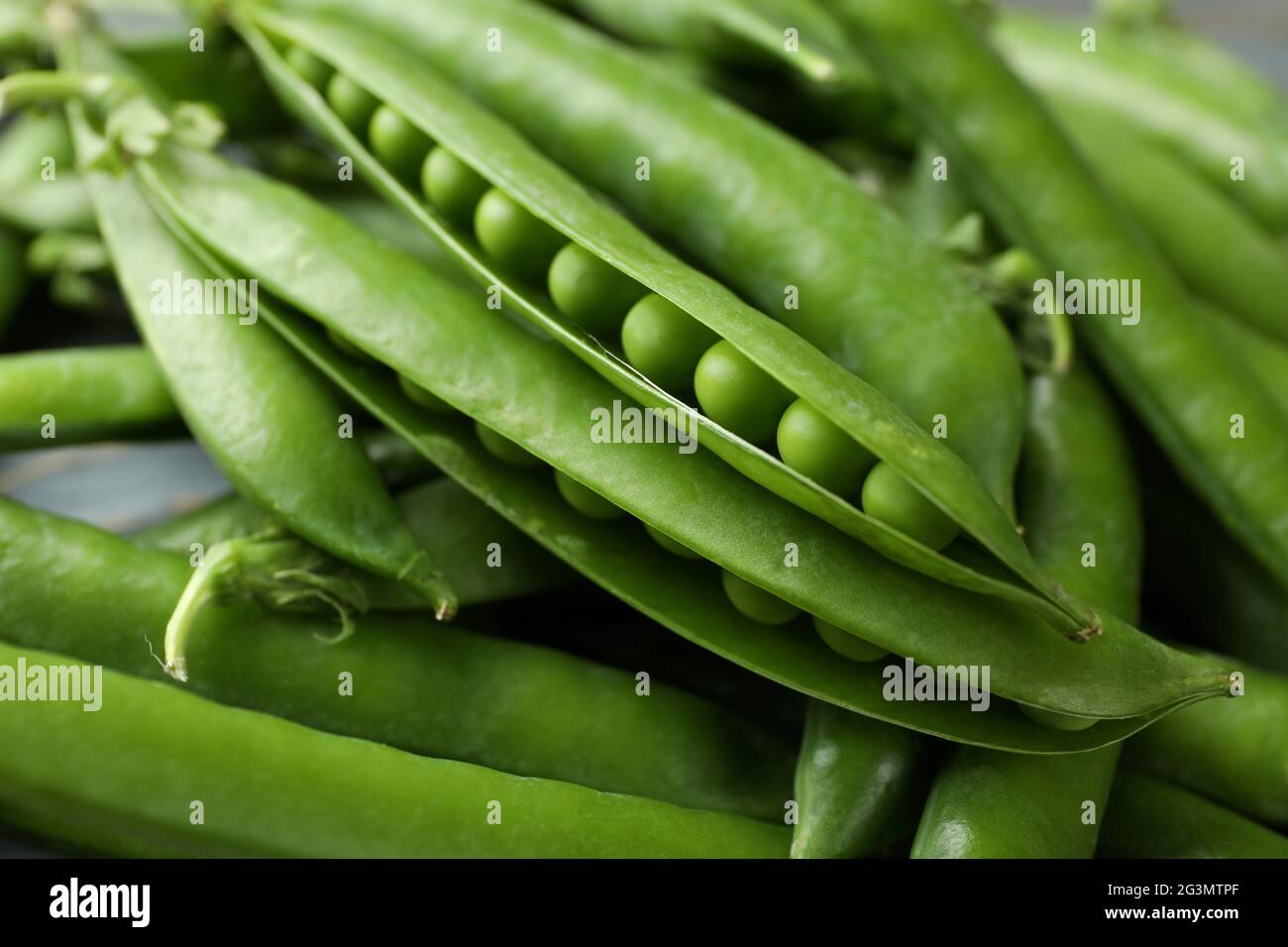 Fresh green pea pods with seeds, close up Stock Photo - Alamy