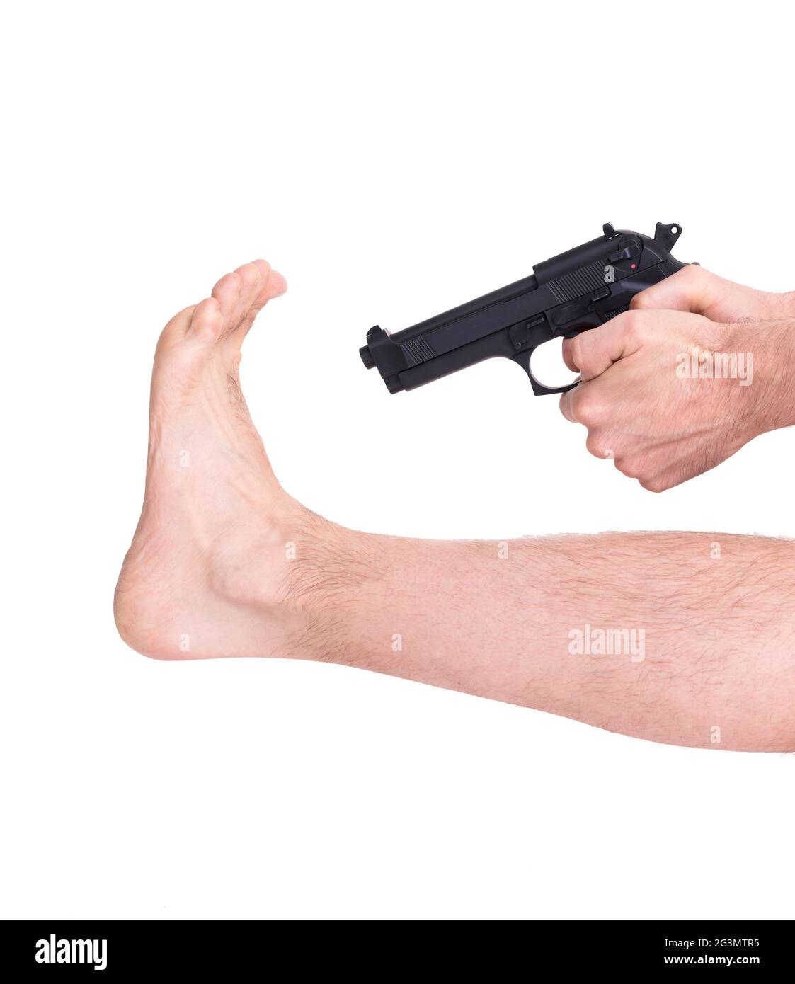 Man shooting himself in the foot Stock Photo - Alamy