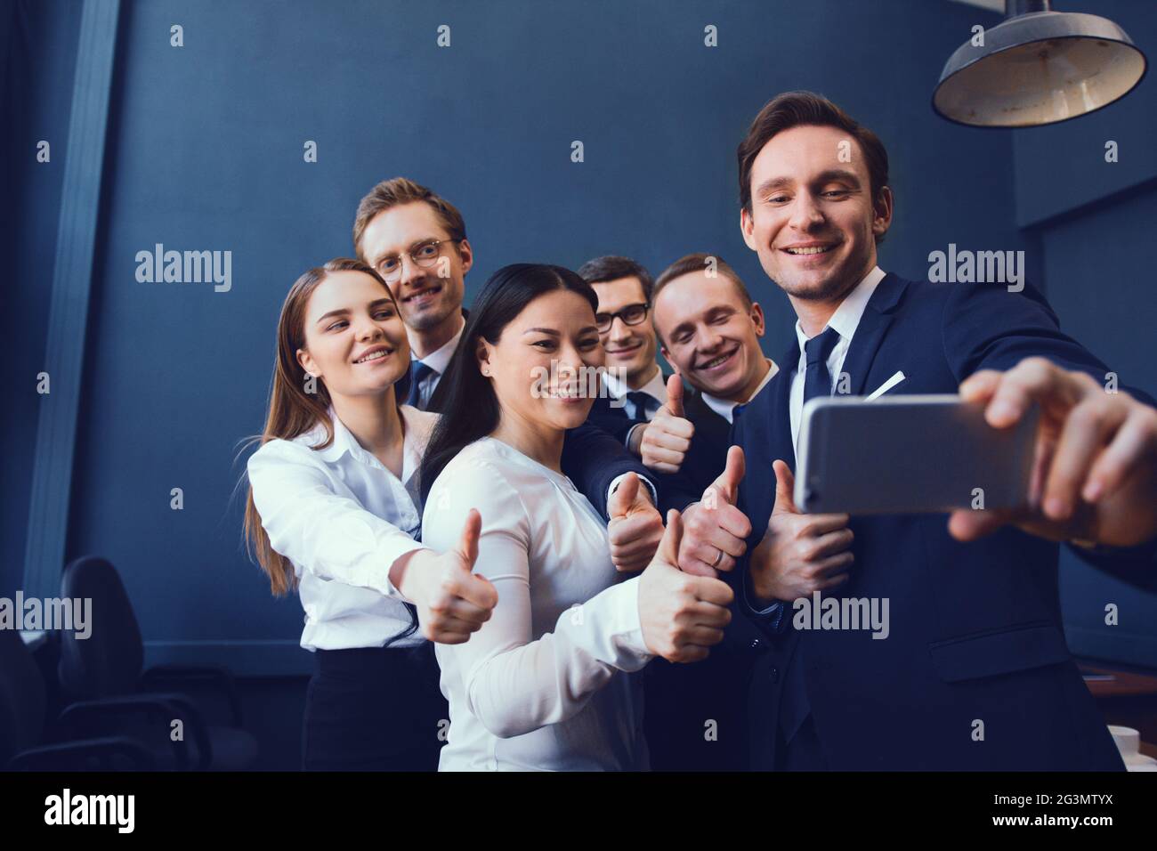 Business smiling posing hi-res stock photography and images - Alamy