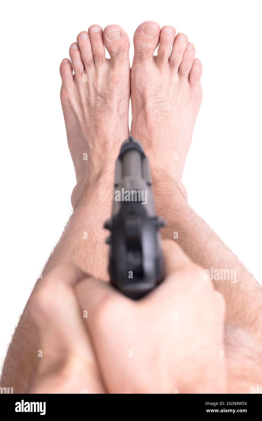Shooting self in foot hi-res stock photography and images - Alamy