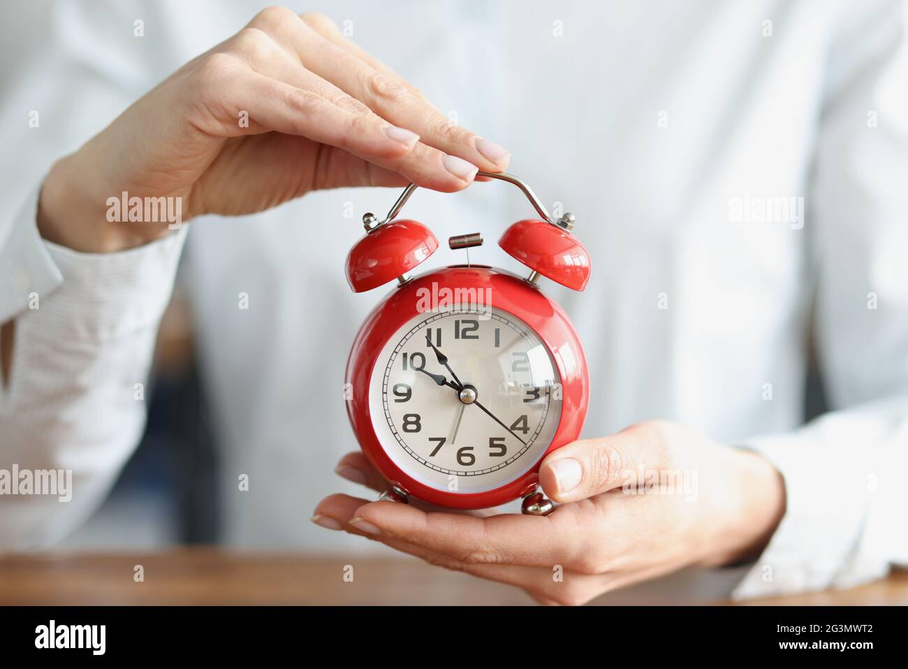 Businessman sitting clock table hi-res stock photography and images - Alamy