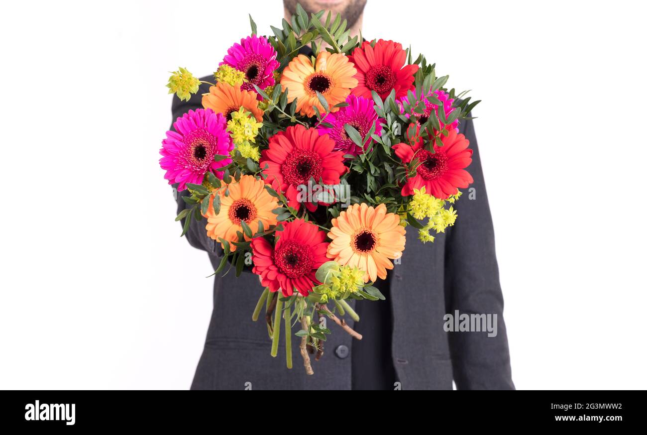 Man is giving flowers Stock Photo - Alamy