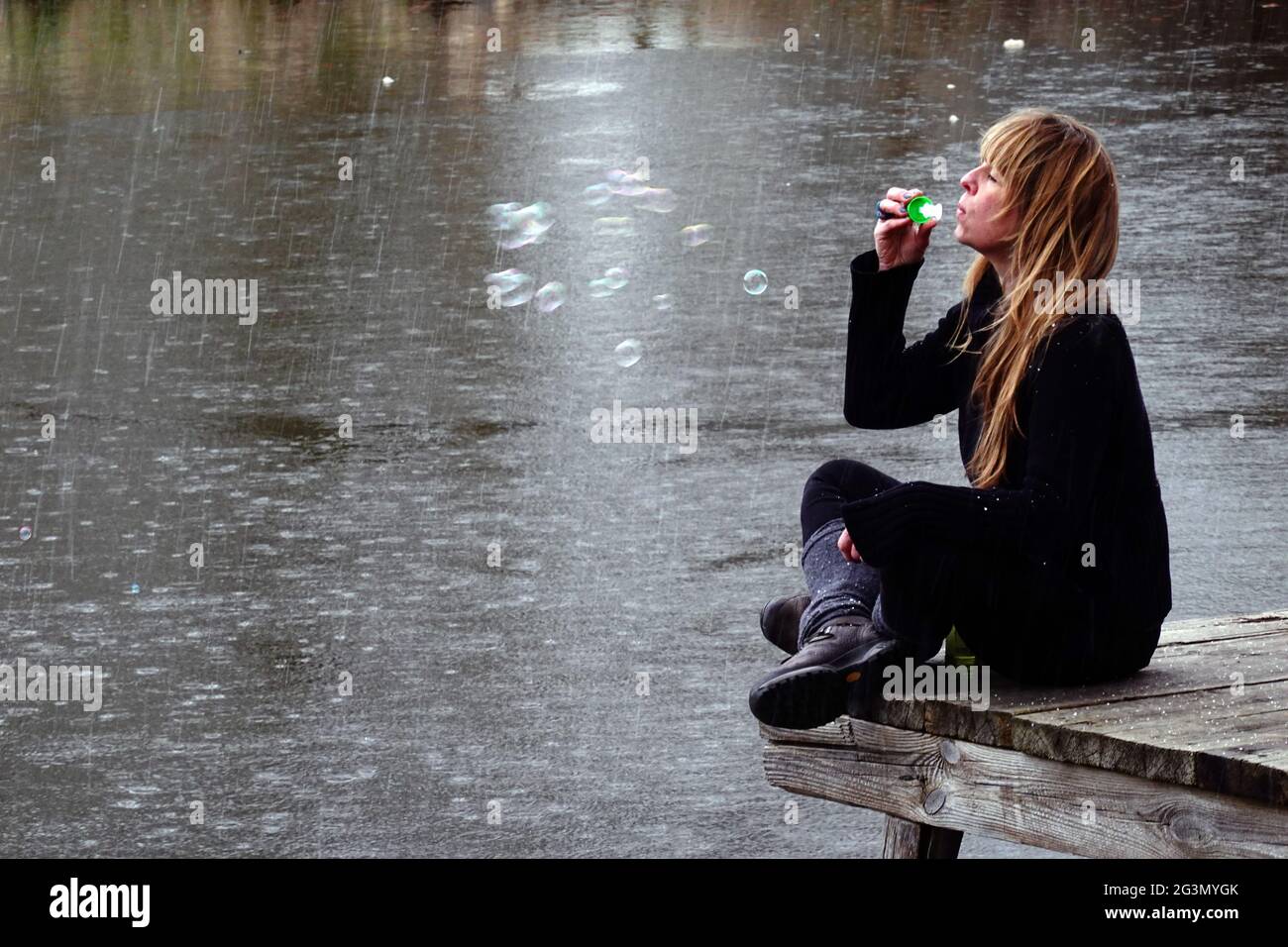 People Sitting In The Rain