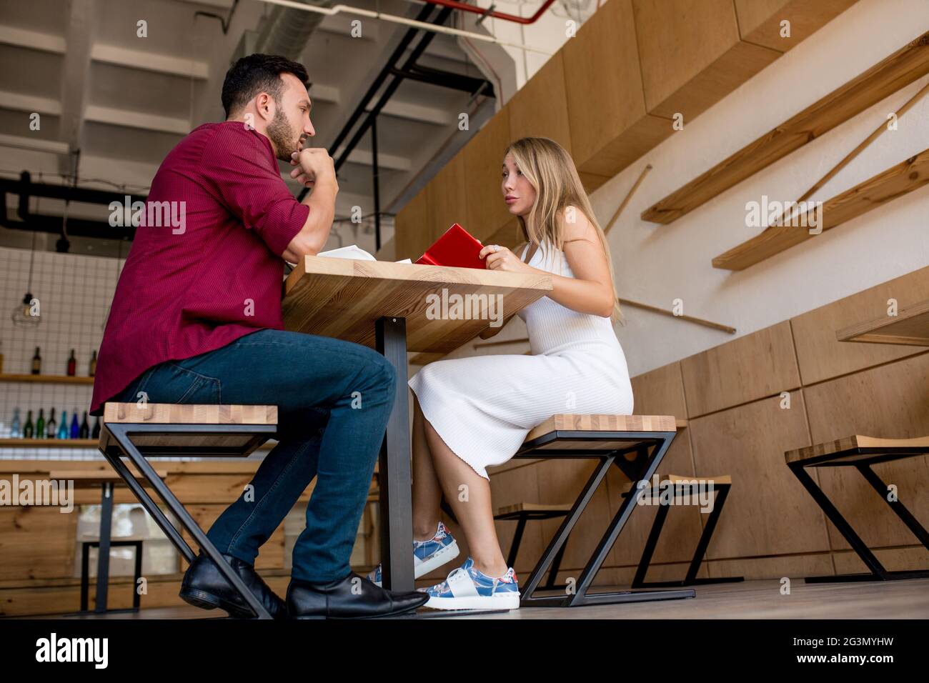 Beloved young couple making notes Stock Photo - Alamy