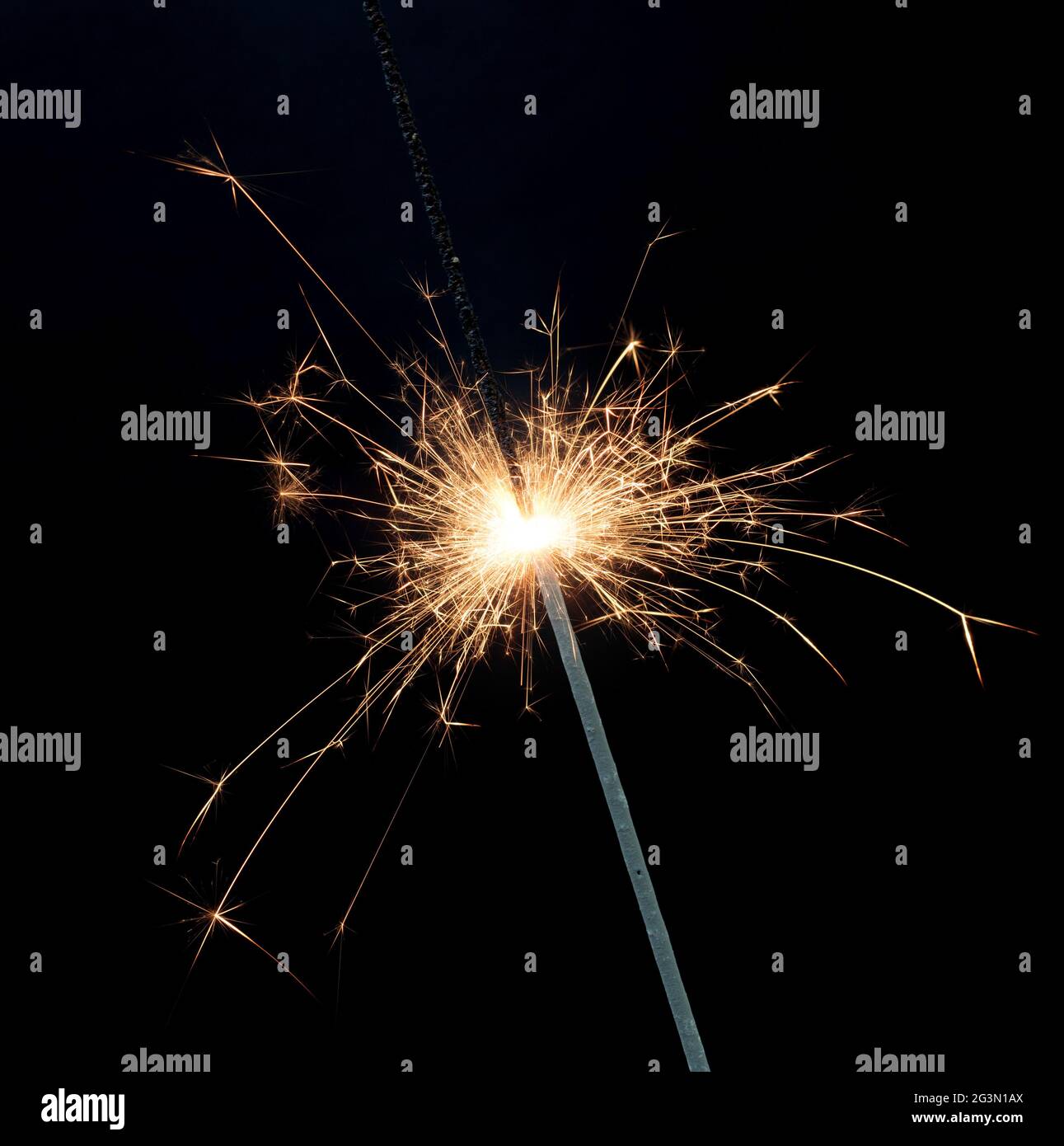 Sparkler isolated on black Stock Photo - Alamy
