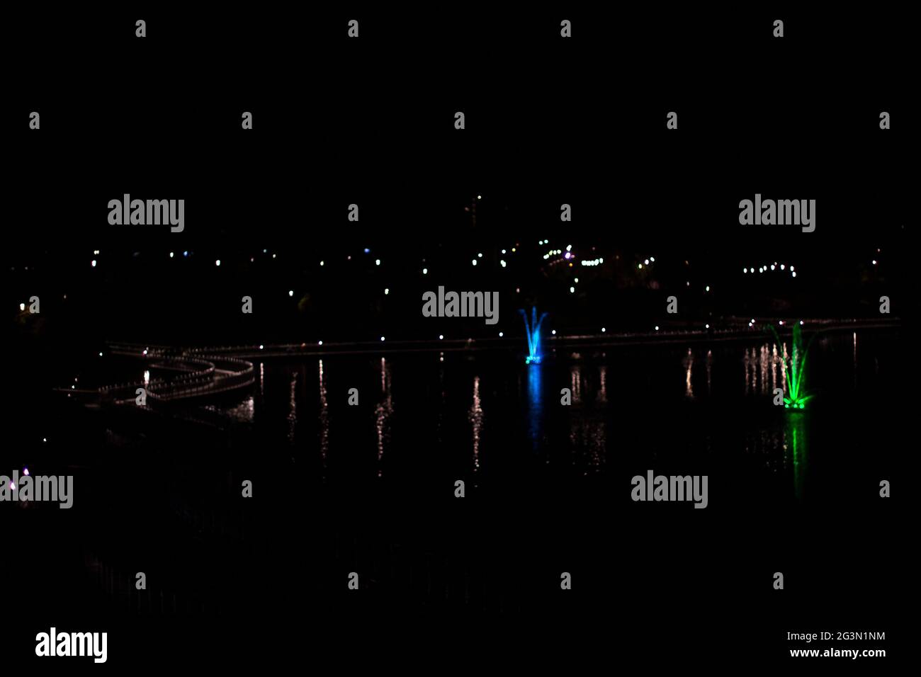 City lights at night. Lights in the dark. Electric light sources in a ...