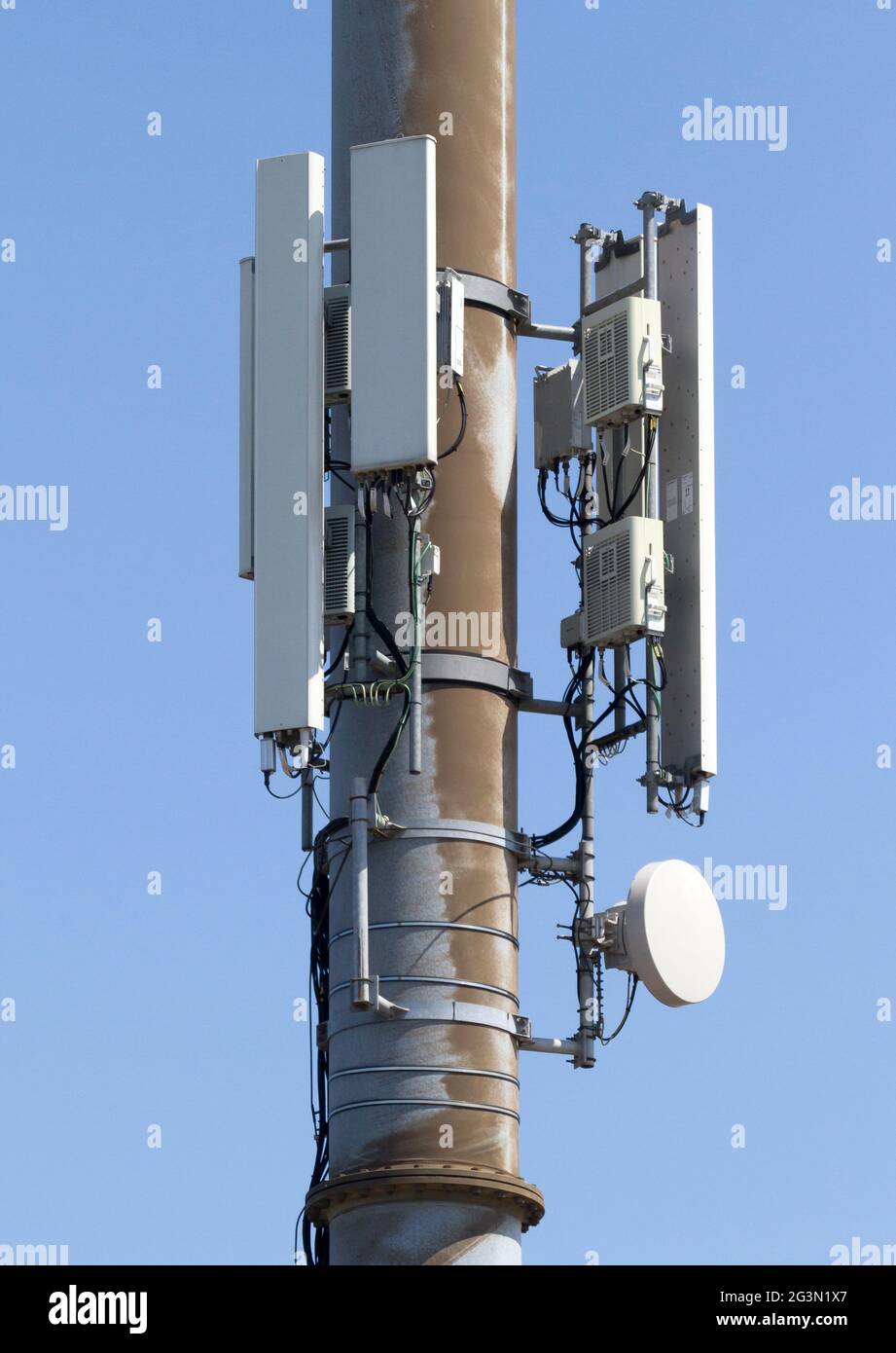 Cell phone tower or mobile cell site with blue sky background Stock ...
