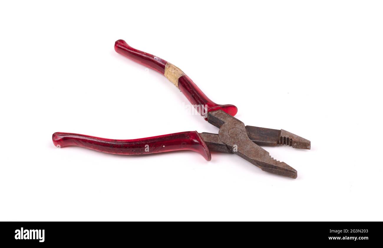 Old red pliers Stock Photo - Alamy