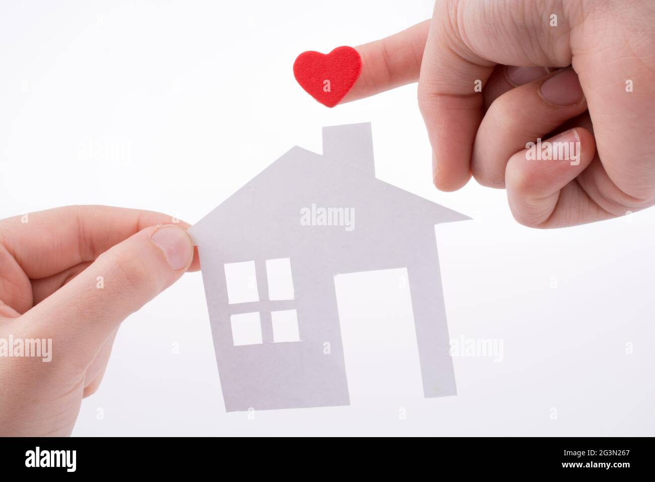 Paper house and heart shape Stock Photo - Alamy