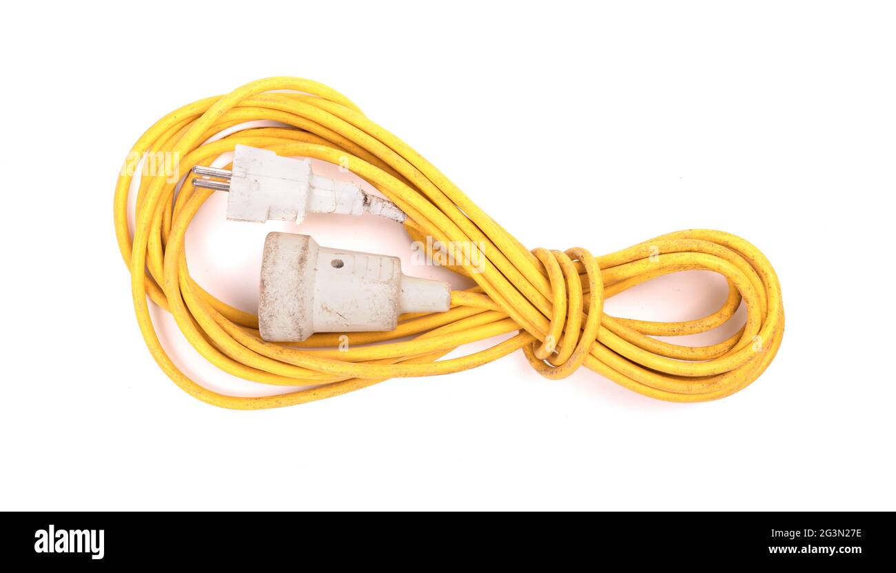 Yellow extension cord isolated on white Stock Photo - Alamy