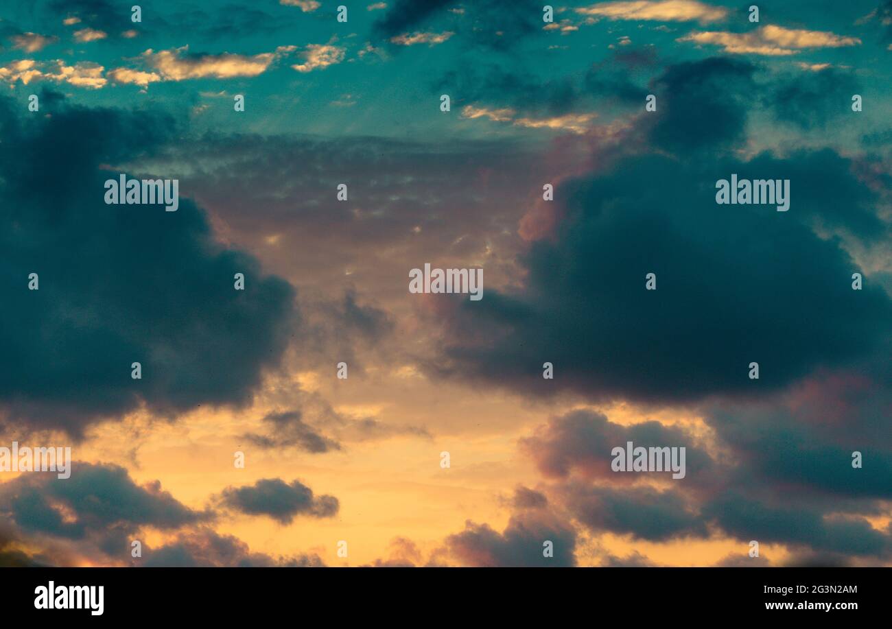 Gray color clouds partly cover the sky Stock Photo - Alamy