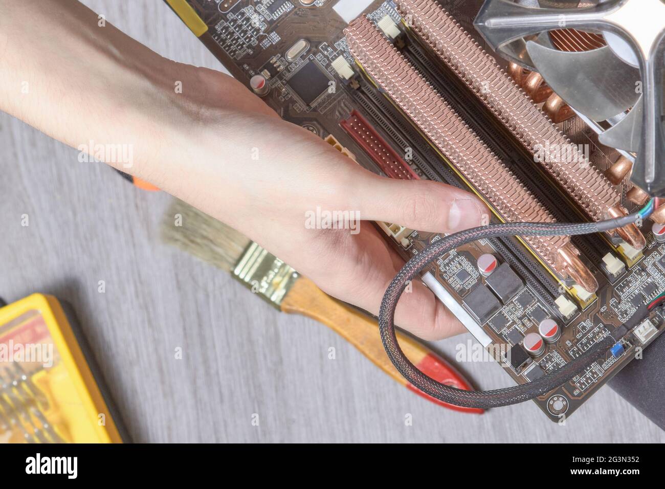 Computer repair cleaning of components, from dust Stock Photo - Alamy