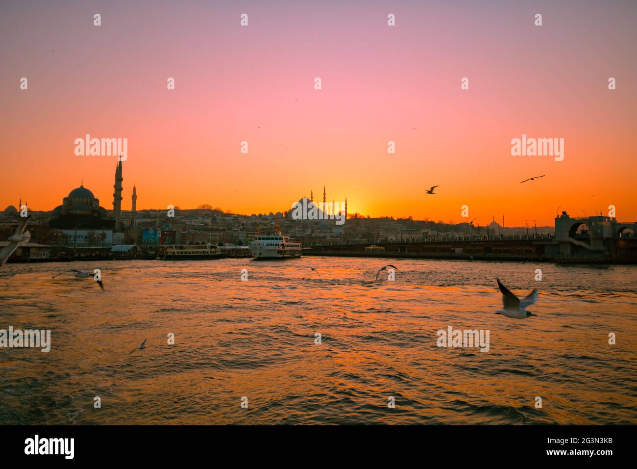 Cityscape of Istanbul at sunset from a ferry on bosphorus Stock Photo ...