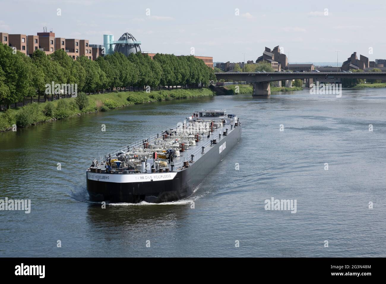 Inland vessel seen from above with pipelines on the deck for industrial ... Inland vessel seen from above with pipelines on the deck for industrial ...