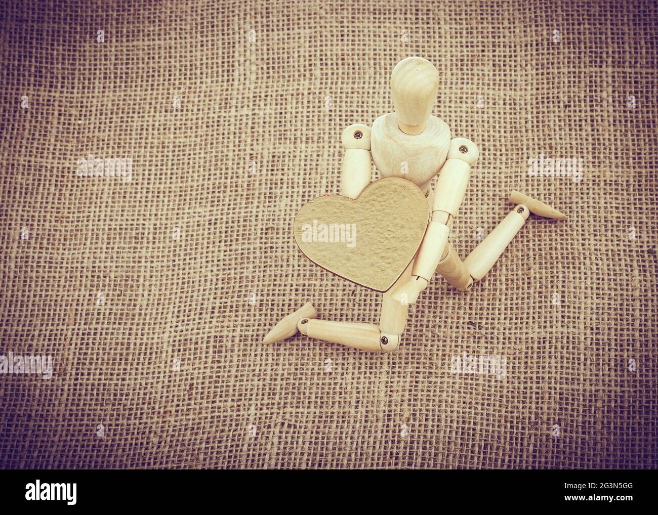 Heart shaped object in the hand Stock Photo - Alamy