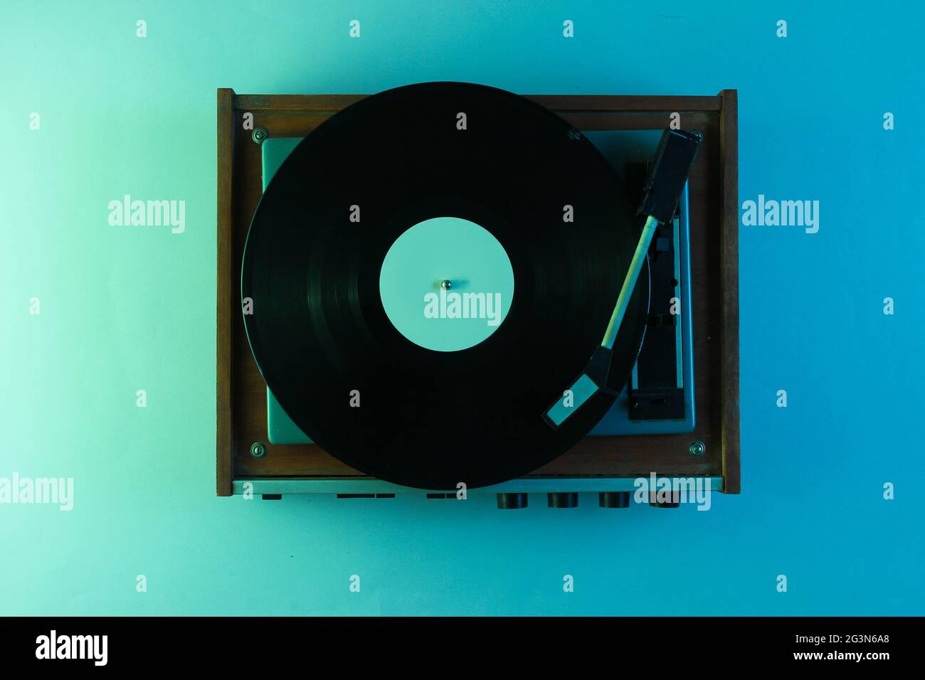 Retro vinyl record player. Neon light, top view Stock Photo - Alamy