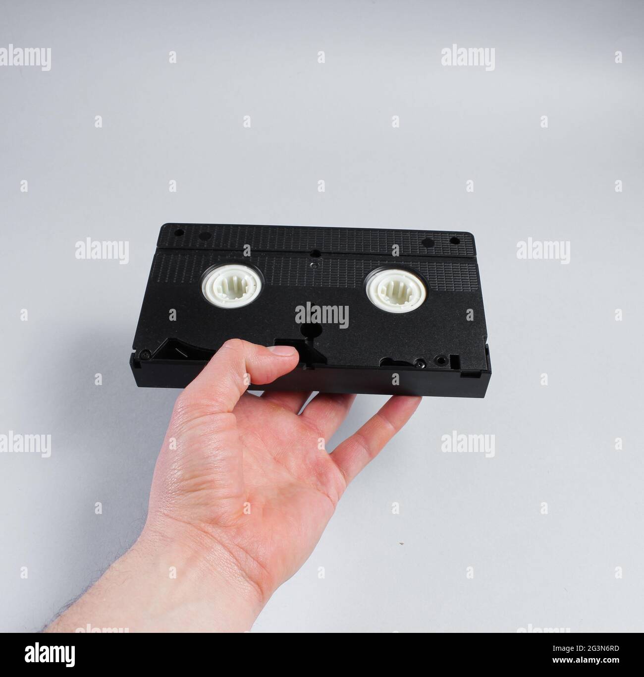 Retro vhs cassette hand hi-res stock photography and images - Alamy