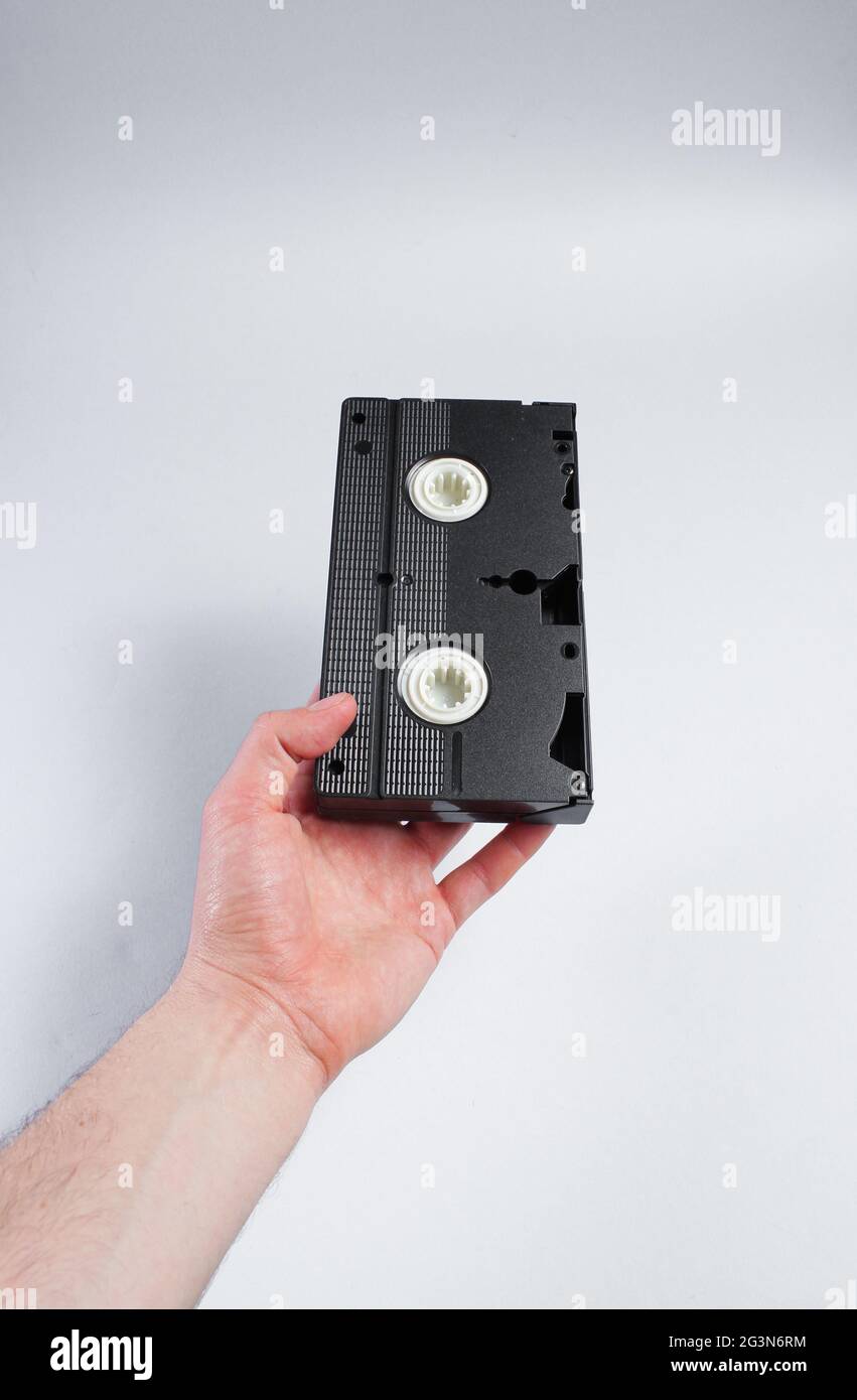 Retro vhs cassette hand hi-res stock photography and images - Alamy