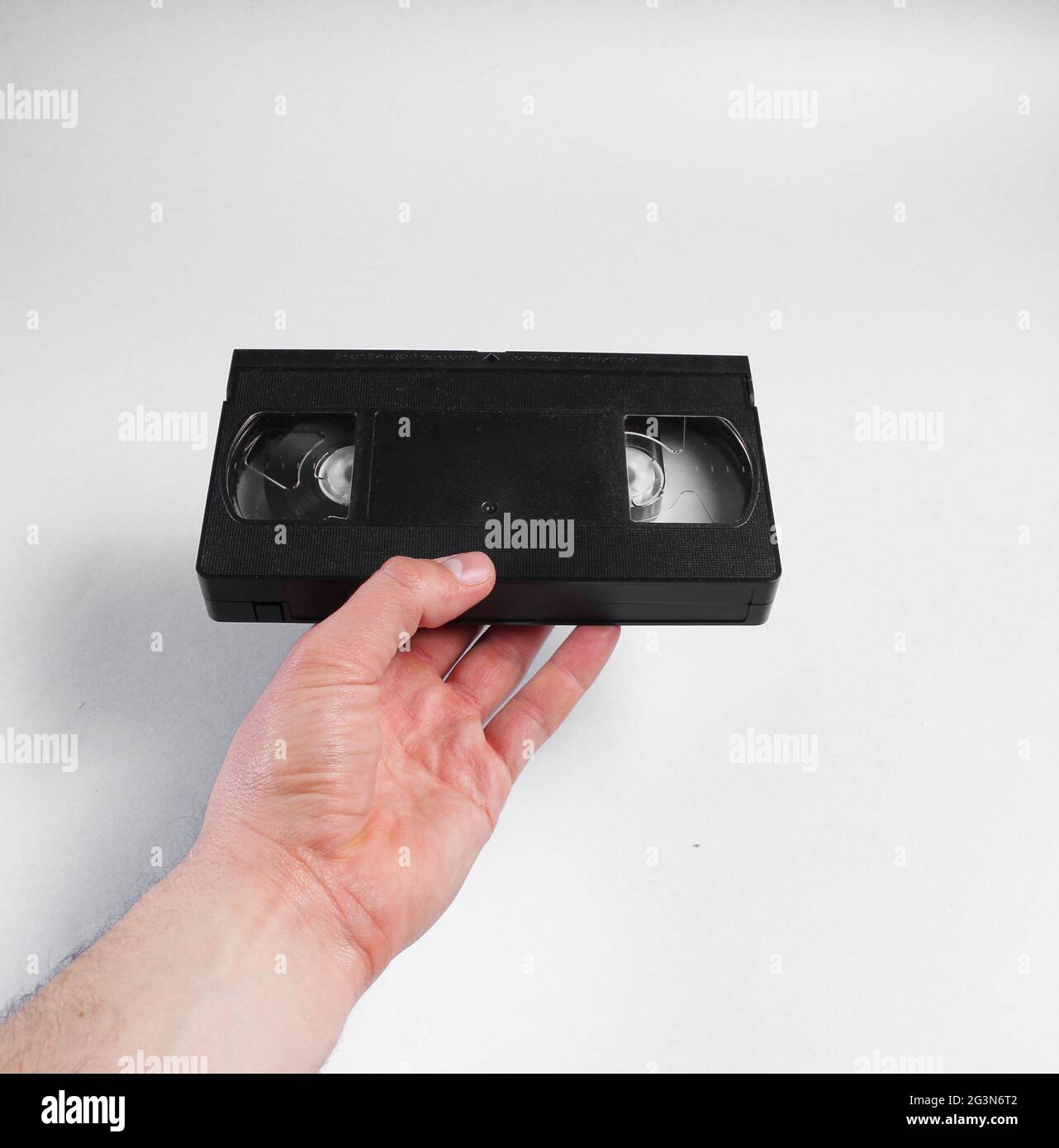 Retro vhs cassette hand hi-res stock photography and images - Alamy