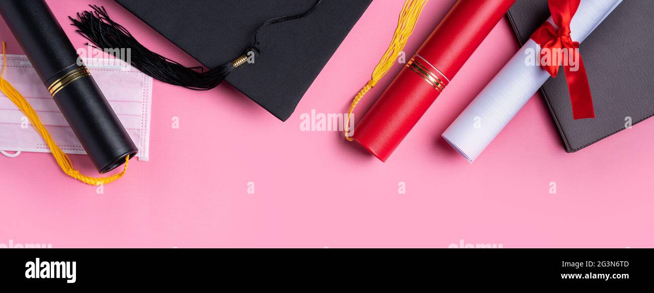 Top view of graduation square academic cap with degree diploma and mask ...