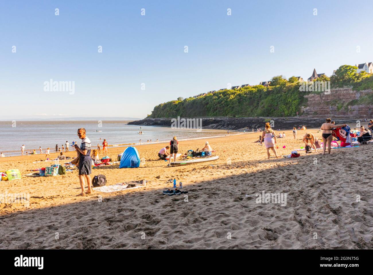 Families enjoying a day out a Barry Island Beach resort, South Wales ...