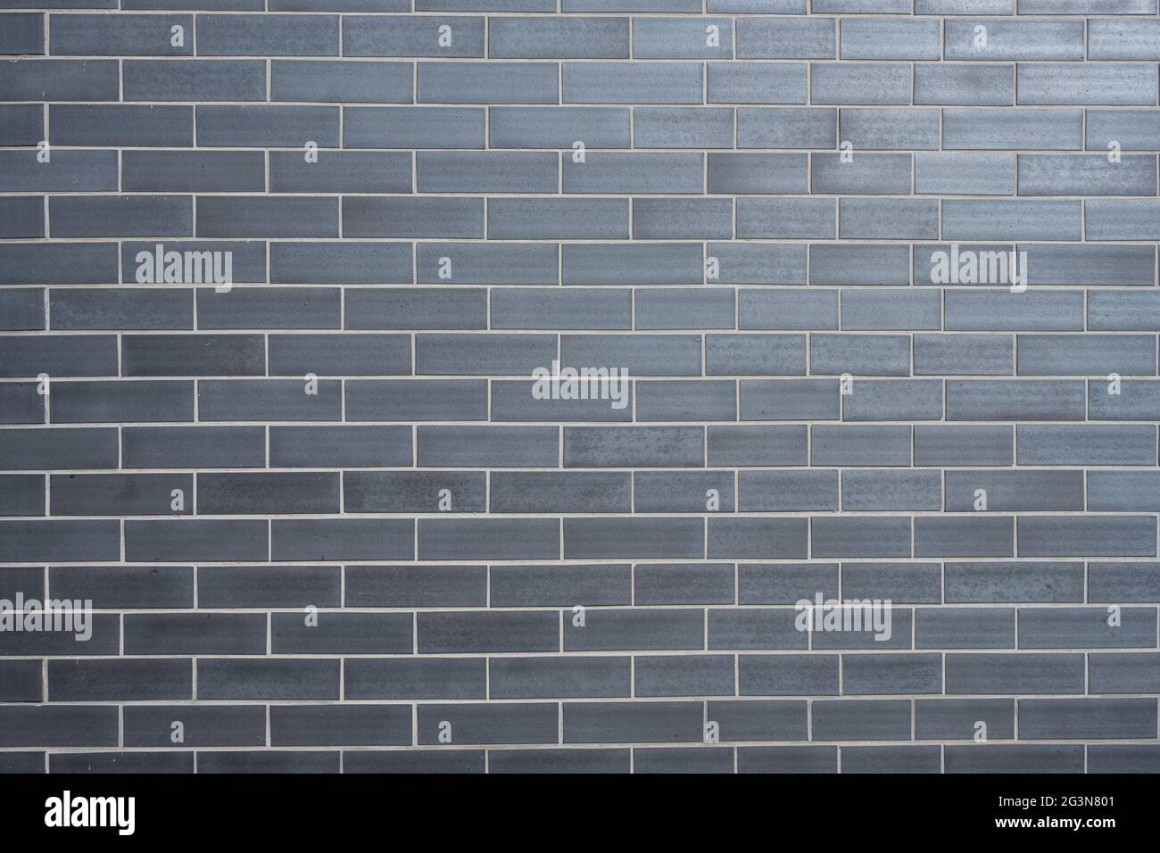 Background from a wall made of gray clinker bricks Stock Photo - Alamy
