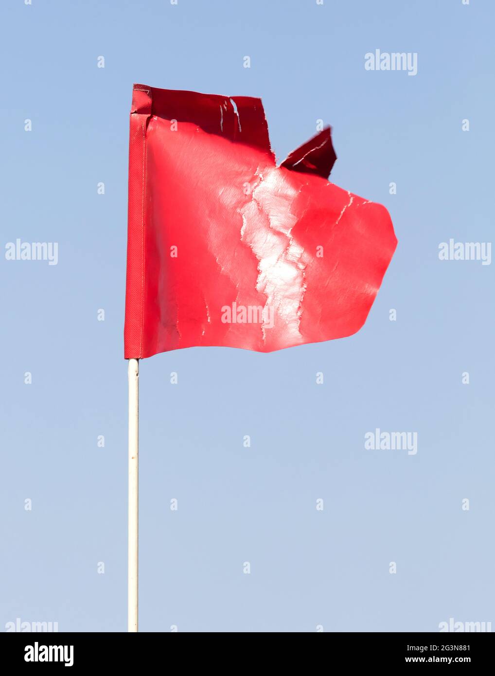 Plastic red flag Stock Photo - Alamy