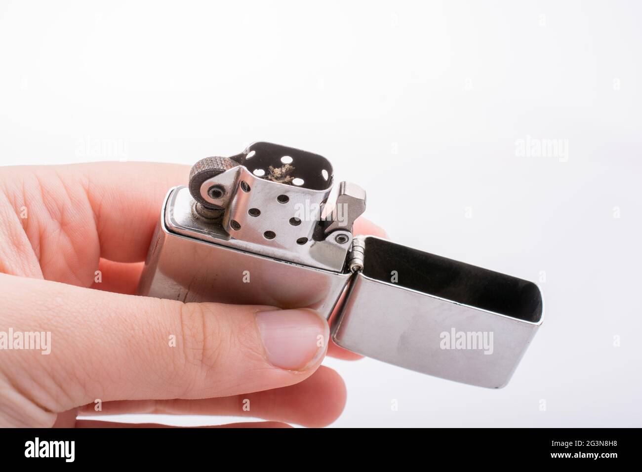 Steel lighter on an isolated background on display Stock Photo - Alamy