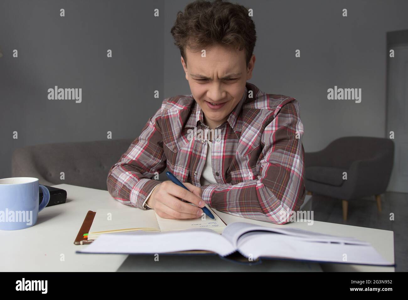 Happy guy studying hi-res stock photography and images - Alamy