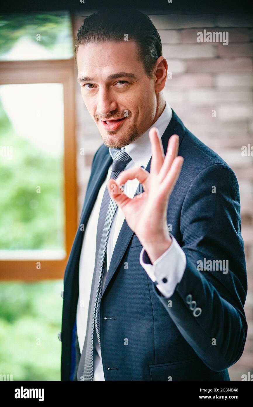 Handsome gesture hi-res stock photography and images - Alamy