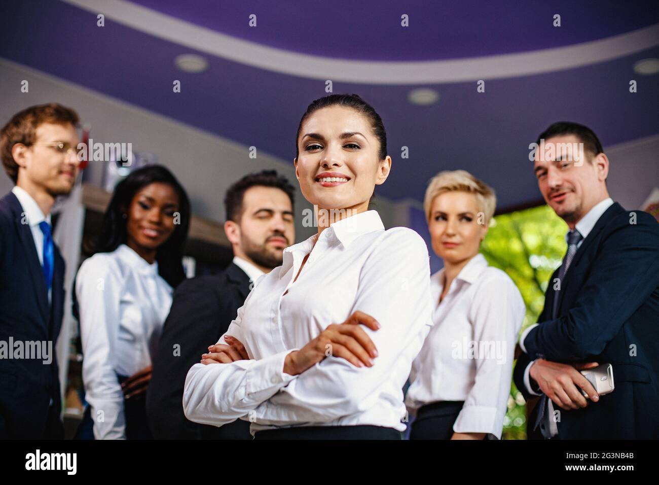 Businessman standing team hi-res stock photography and images - Alamy