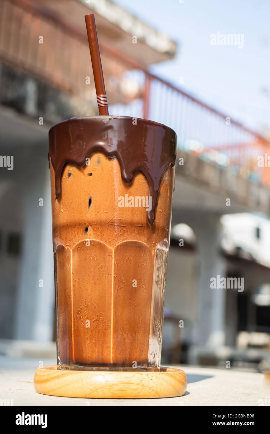 Glass of ice cubes and fresh coffee, stock photo Stock Photo - Alamy