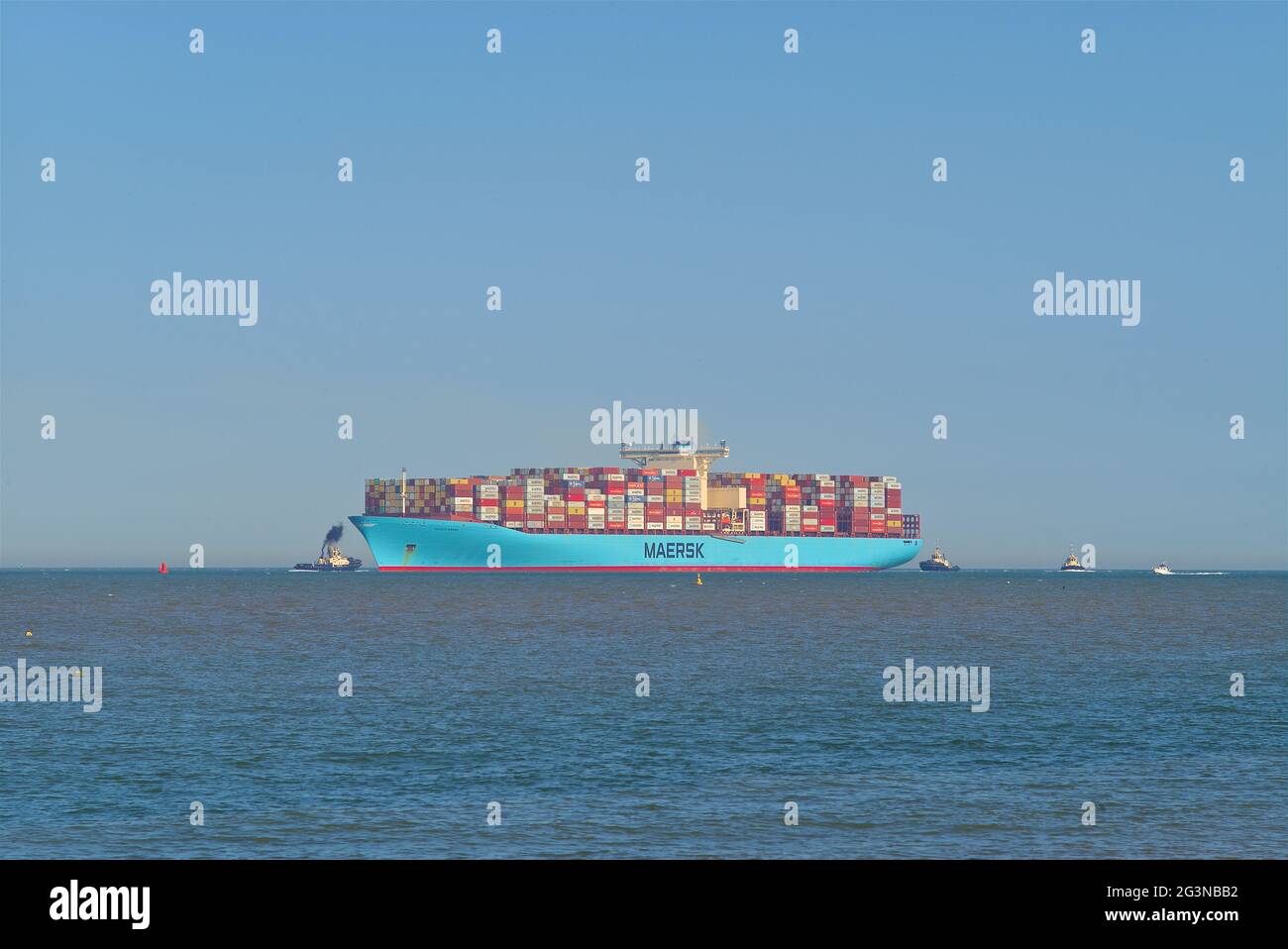 Container ship Estelle Maersk assisted by three tugs entering the Port ...