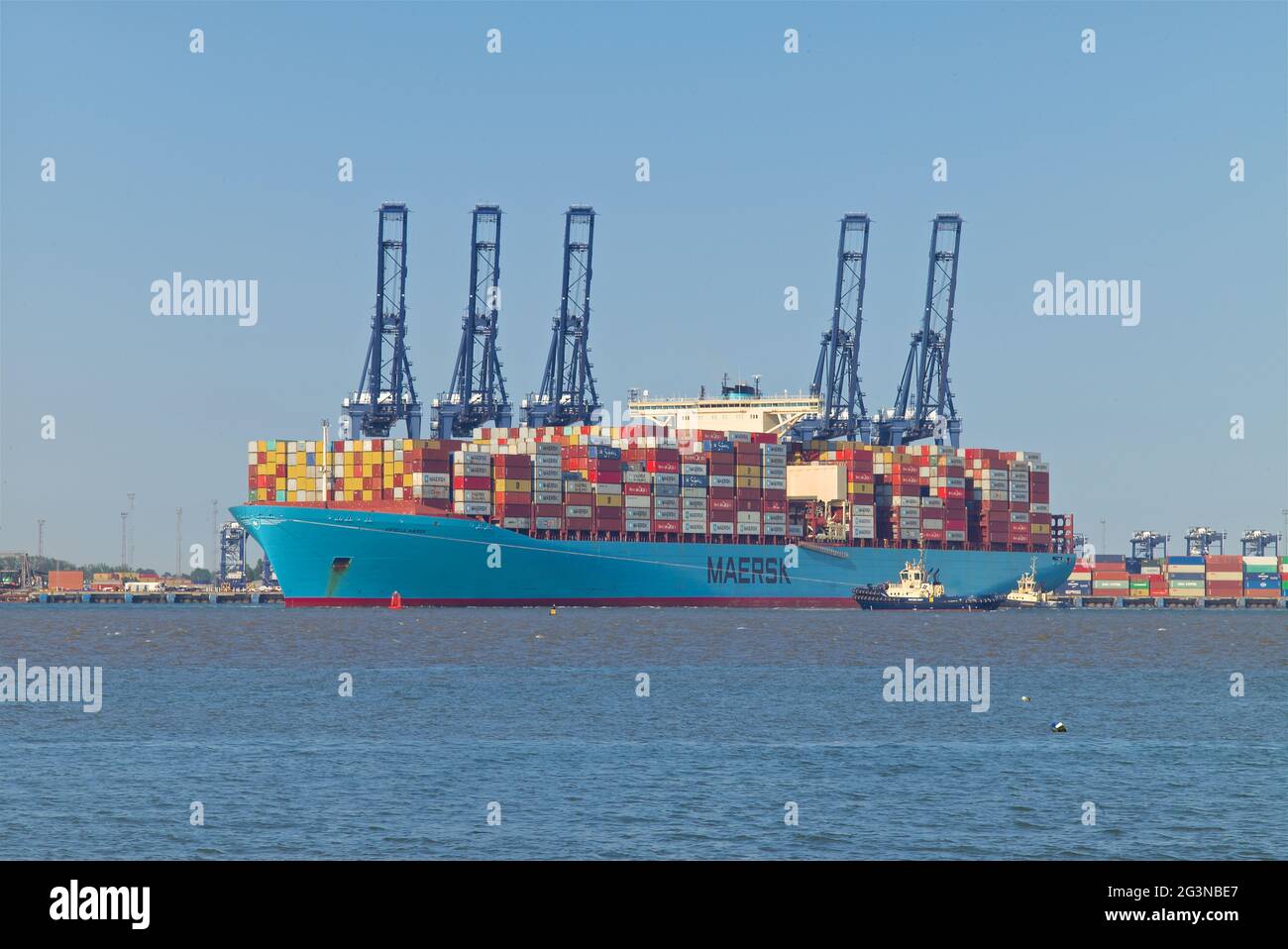 Container ship Estelle Maersk assisted by three tugs entering the Port ...