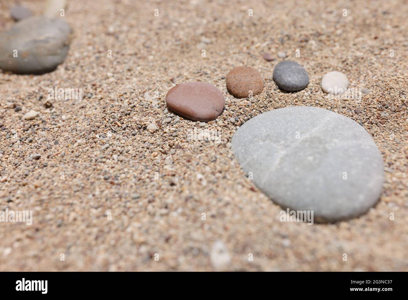 Barefoot child pebbles hi-res stock photography and images - Alamy