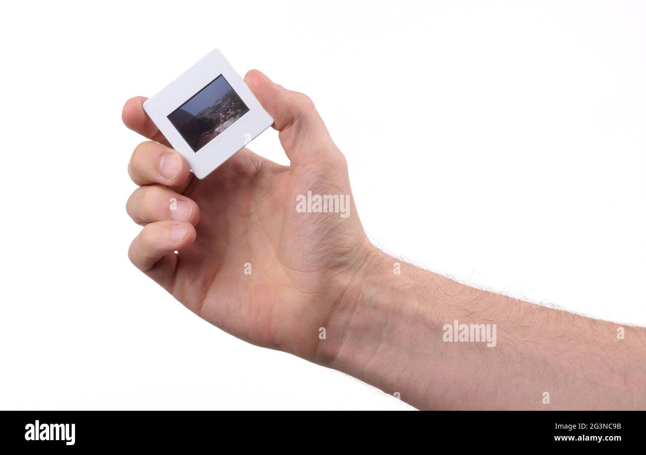 Holding a very old slide photo Stock Photo - Alamy