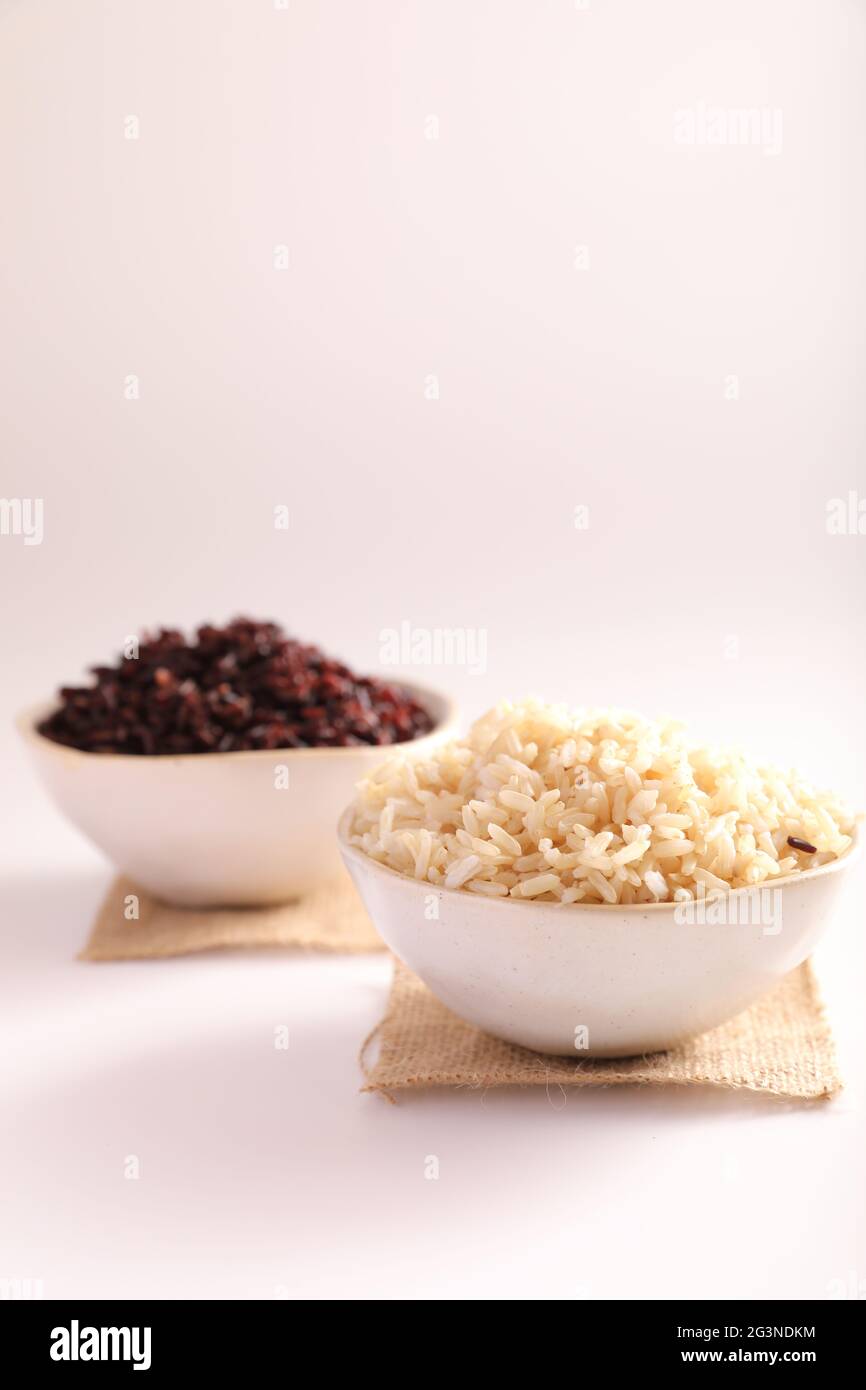 Organic boiled brown rice on bowl isolated in white background Stock ...