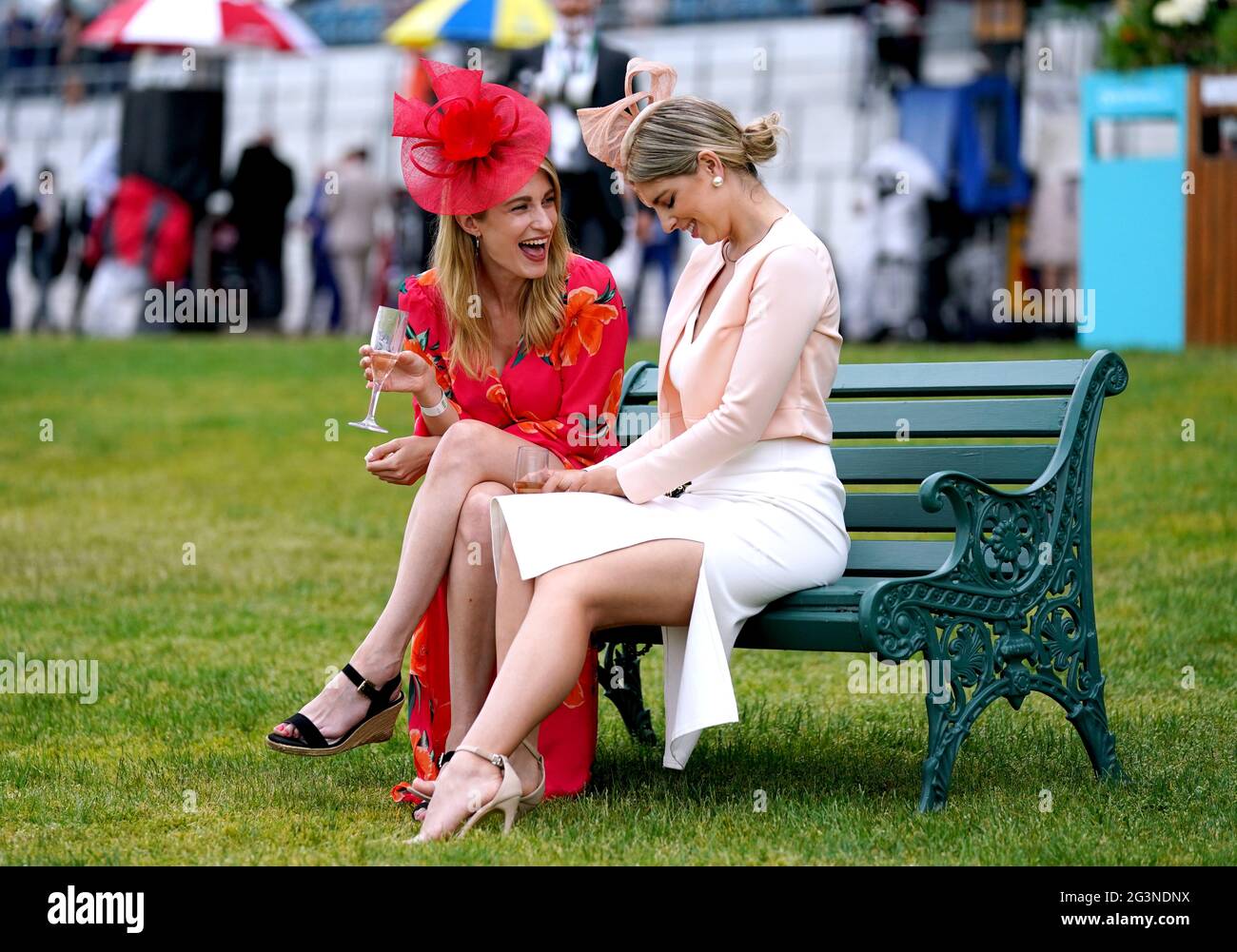 Racegoers enjoy a drink during day three of Royal Ascot at Ascot ...